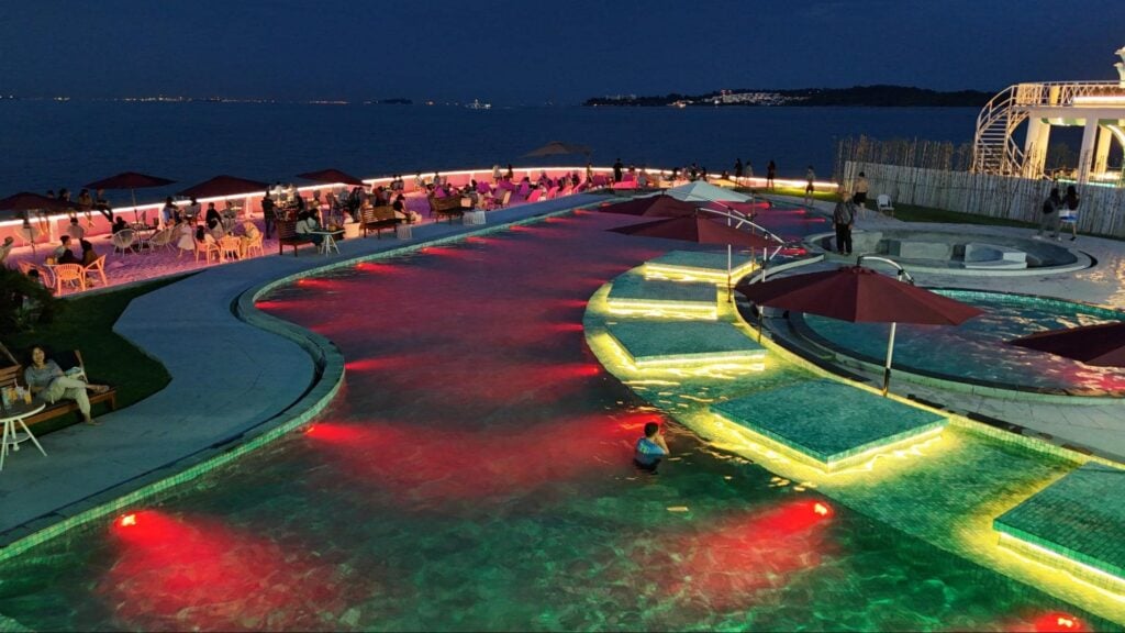 Blue Fire Beach Club In Batam Has Pink Sand & A Swim-Up Bar